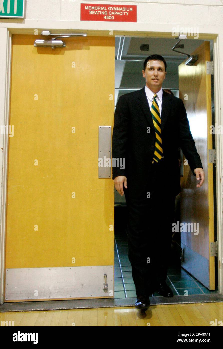 Former NBA player and Florida Atlantic head coach Rex Walters walks ...