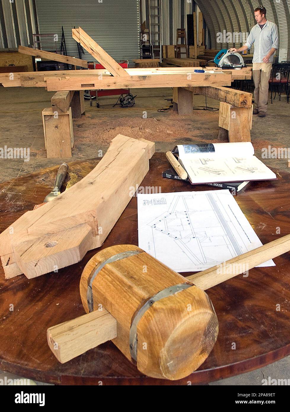 A brace, blueprints and a "beetle" mallet are seen at Will Alexander's ...