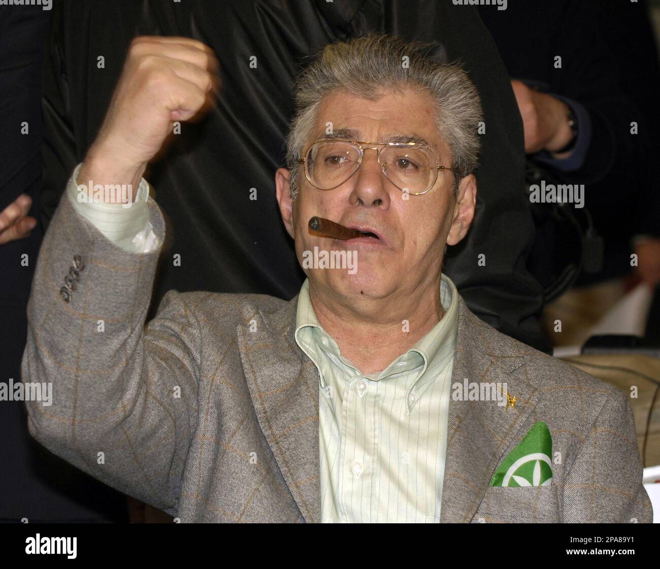 Leader of Italy's Northern League party Umberto Bossi celebrates at the ...