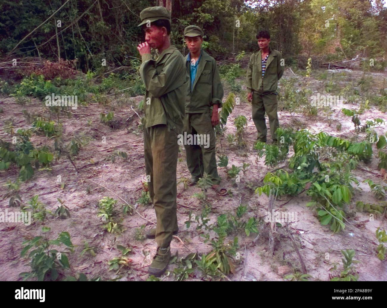**FILE**Khmer Rouge soldiers, assigned to guard Pol Pot, look on ...