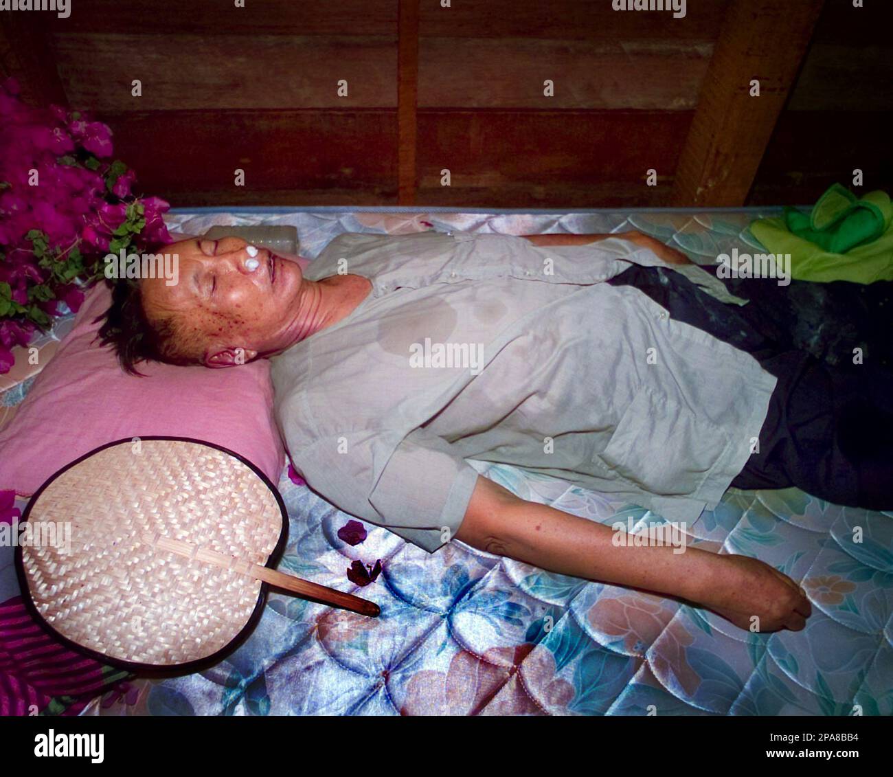 **FILE** The body of Khmer Rouge leader Pol Pot lies on a mattress in a small hut near the Thai ...