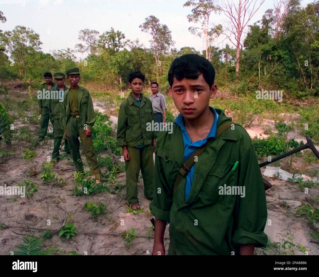 **FILE**Khmer Rouge soldiers, assigned to guard Pol Pot, look on ...