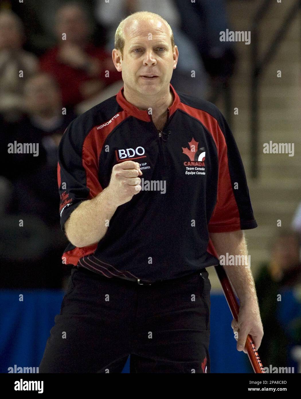 Team Canada skip Kevin Martin reacts after scoring two points in the ...