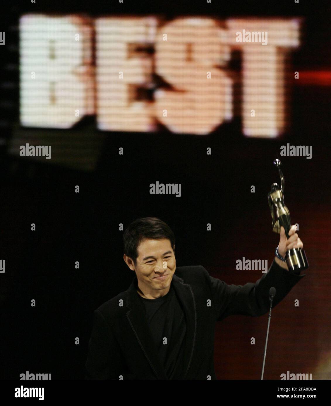Hong Kong movie actor Jet Li, displays his trophy after being named ...