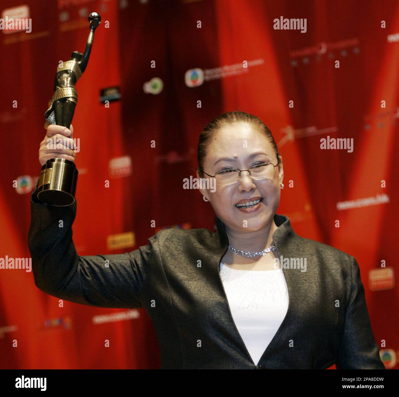 Chinese actress Si Qin Gao Wa holds her trophy for the Best Actress for ...