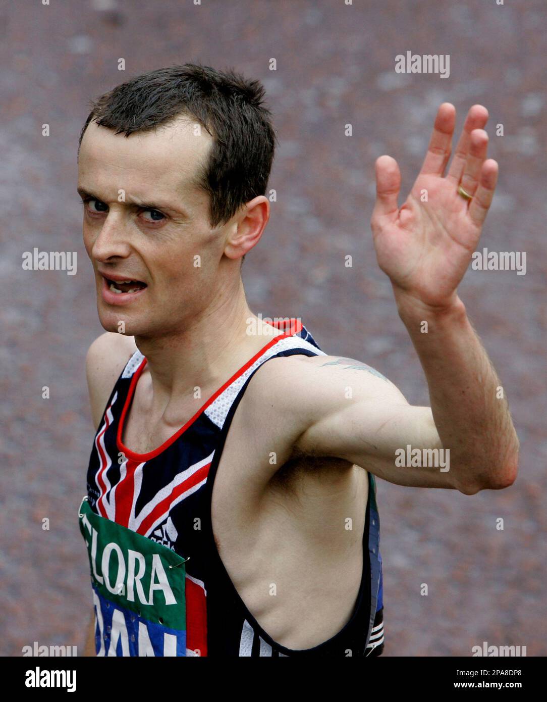 First British male runner Dan Robinson finishes the men's 2008 London ...