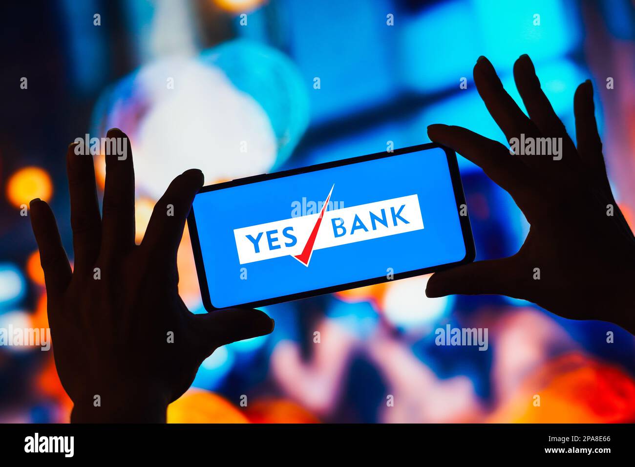 In this photo illustration, the Yes Bank Limited logo seen displayed on ...