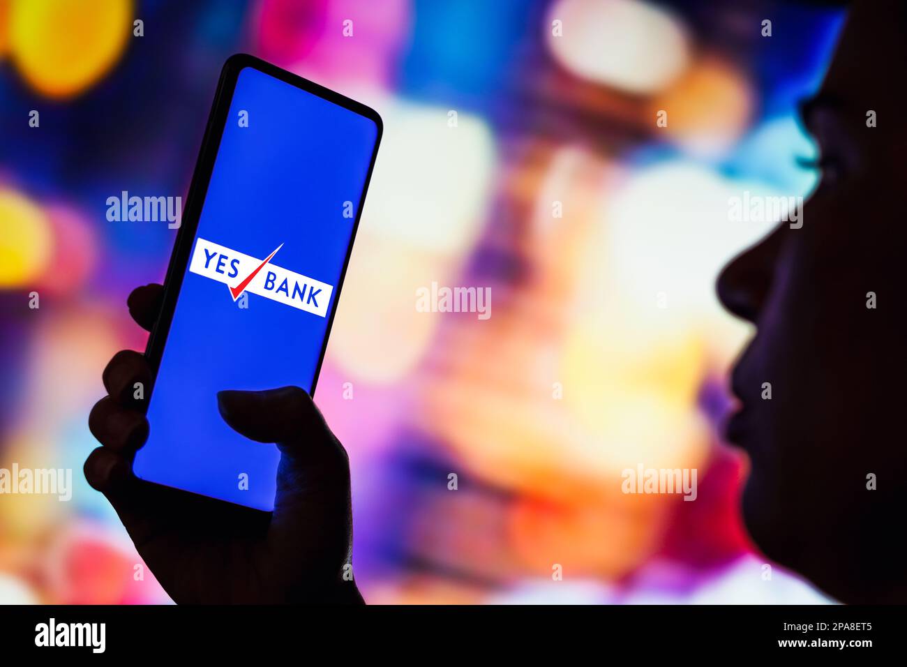 In this photo illustration, the Yes Bank Limited logo seen displayed on ...