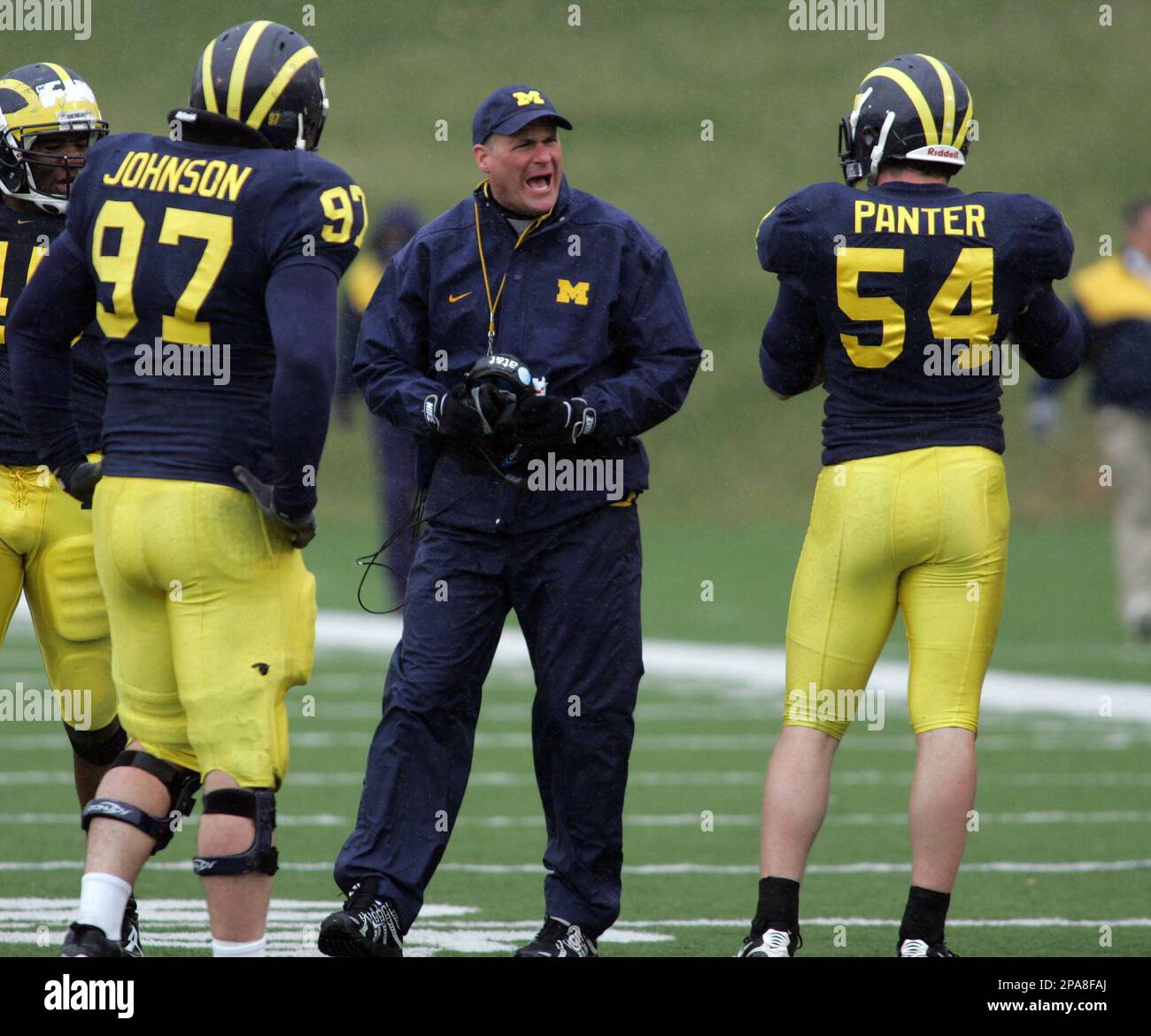 Michigan defensive tackle Will Johnson (97) watches as head coach Rich ...