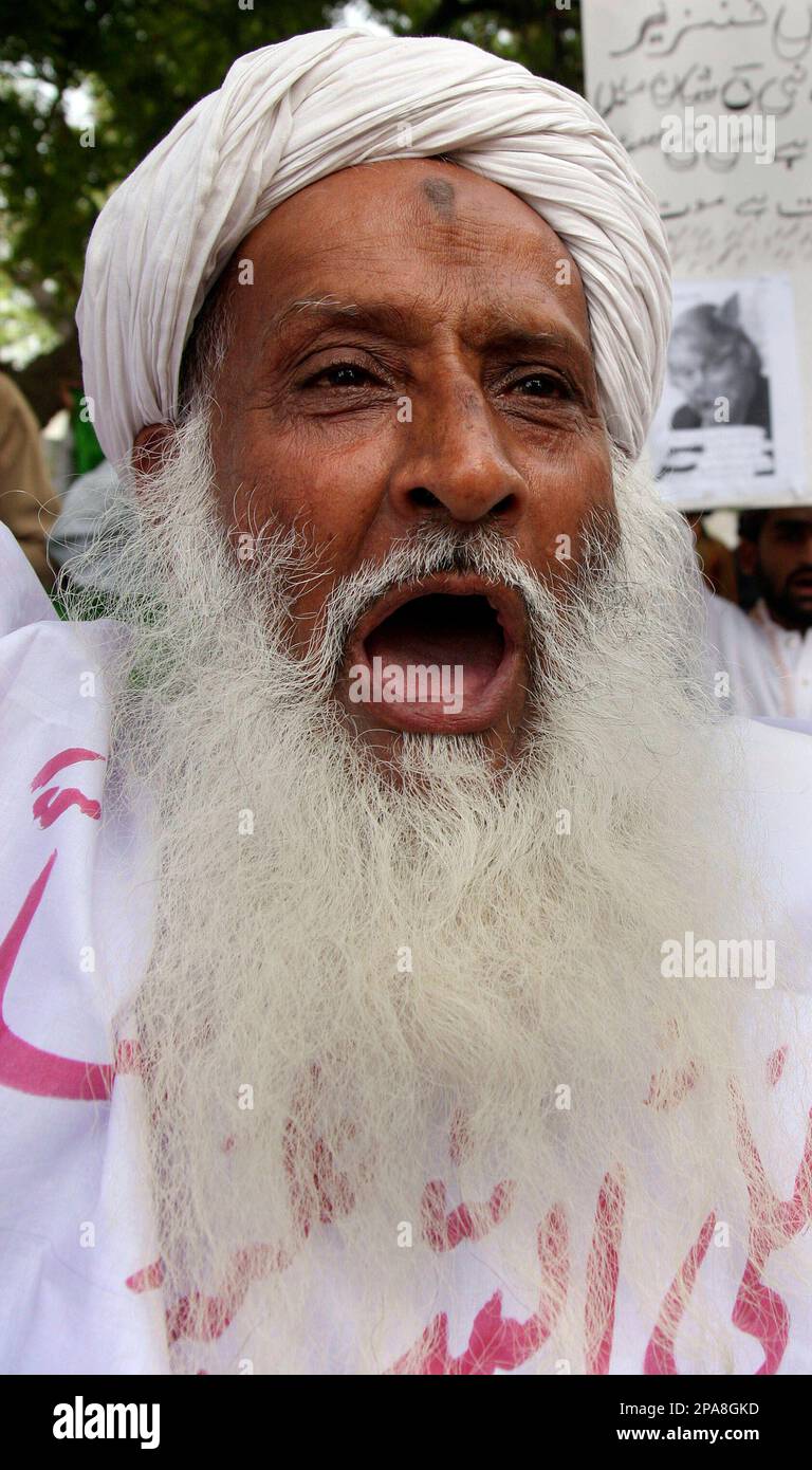 A supporter of a Pakistan Islamic party Jamat Ahl-e-Sunnat chants ...