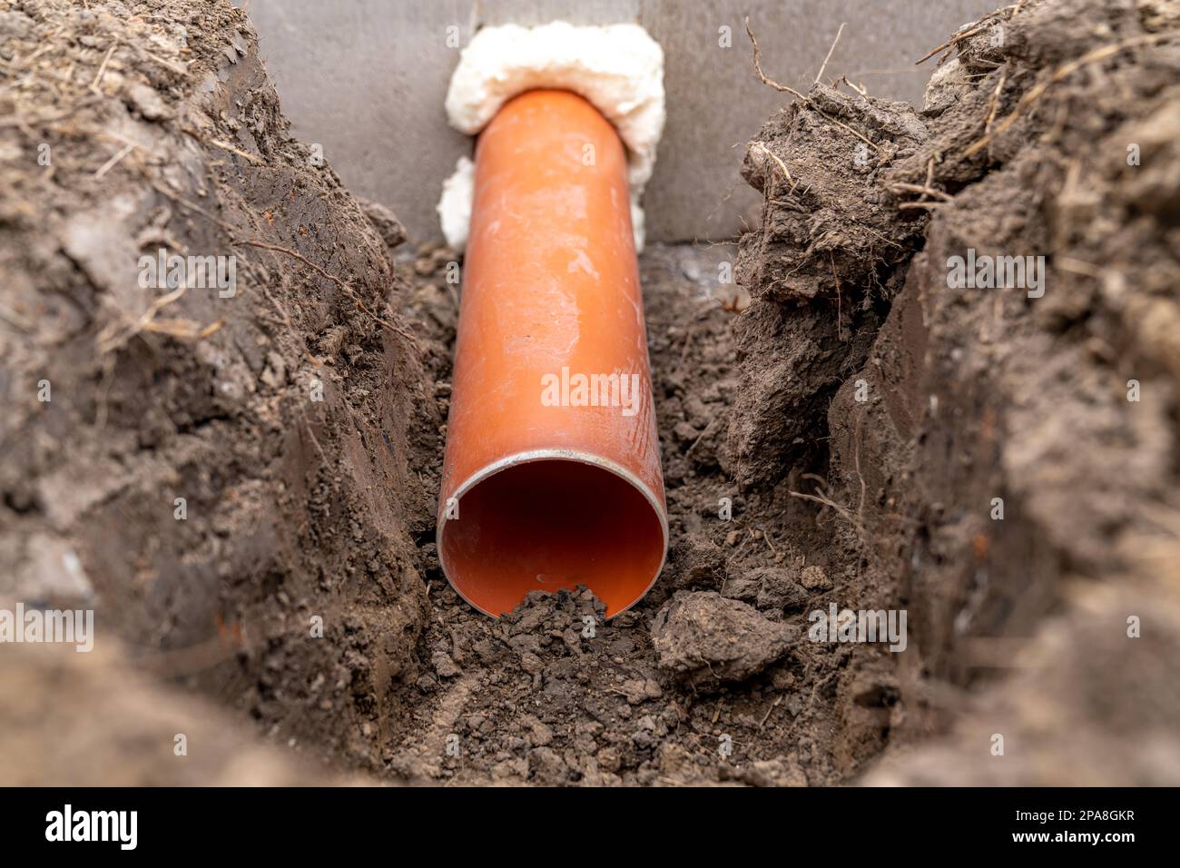 plastic pipe for sewage network in the base plate at the construction ...