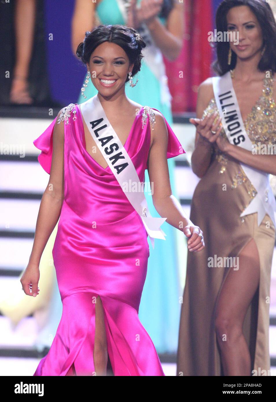 Miss Alaska, Courtney Erin Carroll, reacts as she is awarded the new ...