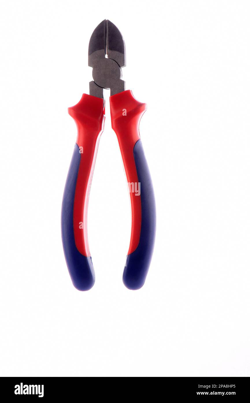plastic handle side cutter on a white background Stock Photo - Alamy