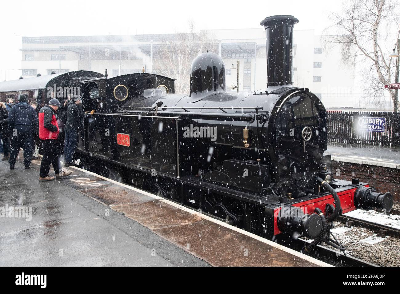 LNWR Coal Tank steam locomotive built 1888 being admired by passengers ...