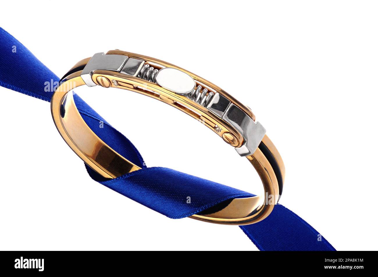 gold bracelet for men wrapped in blue ribbon Stock Photo - Alamy
