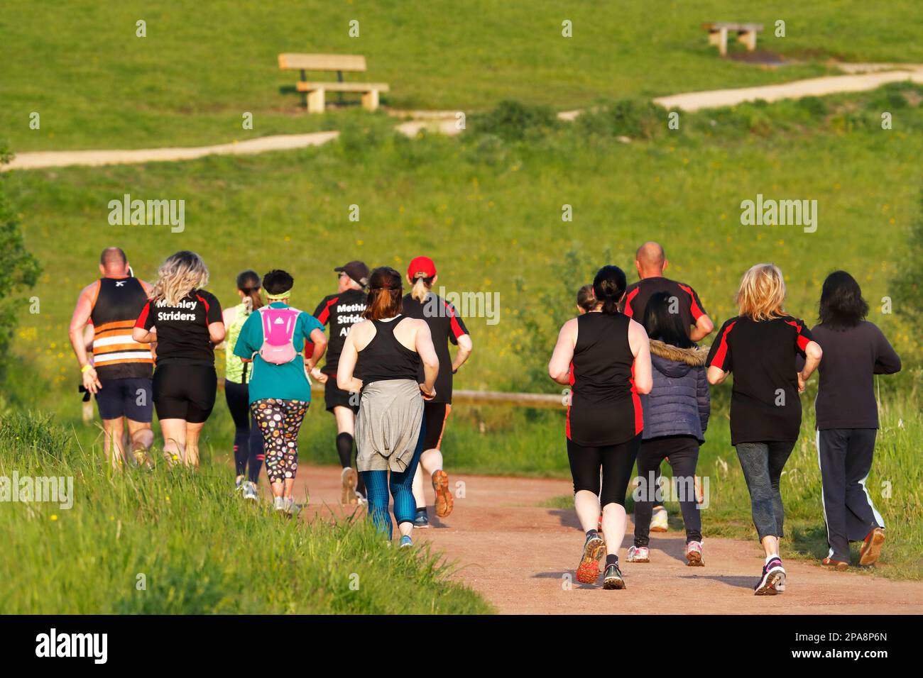 Runners and Joggers from the Methley Striders running club Stock Photo ...