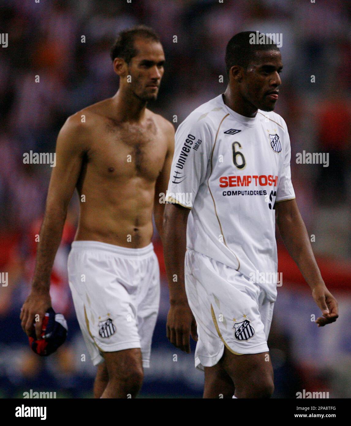 Brazil's Santos' Rodrigo Souto, left, and Betao leave the field at the ...