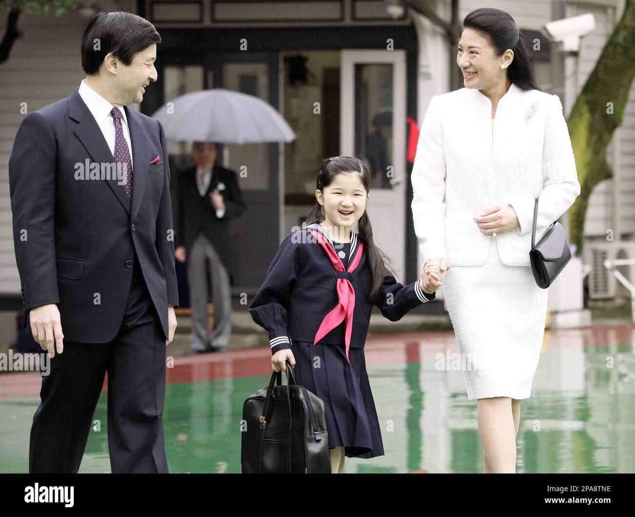 Japanese Princess Aiko, center, walks with her parents Crown Peince ...