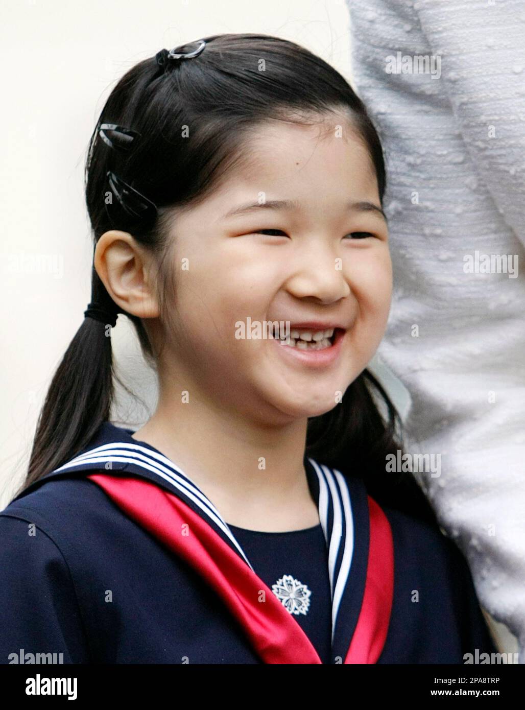 Japan's Princess Aiko, accompanied by her mother Crown Princess Masako ...