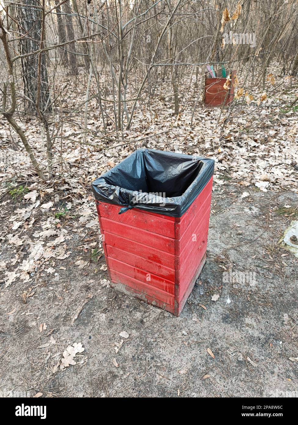 a wooden dustbin for garbage in the forest nature conservation ecology ...