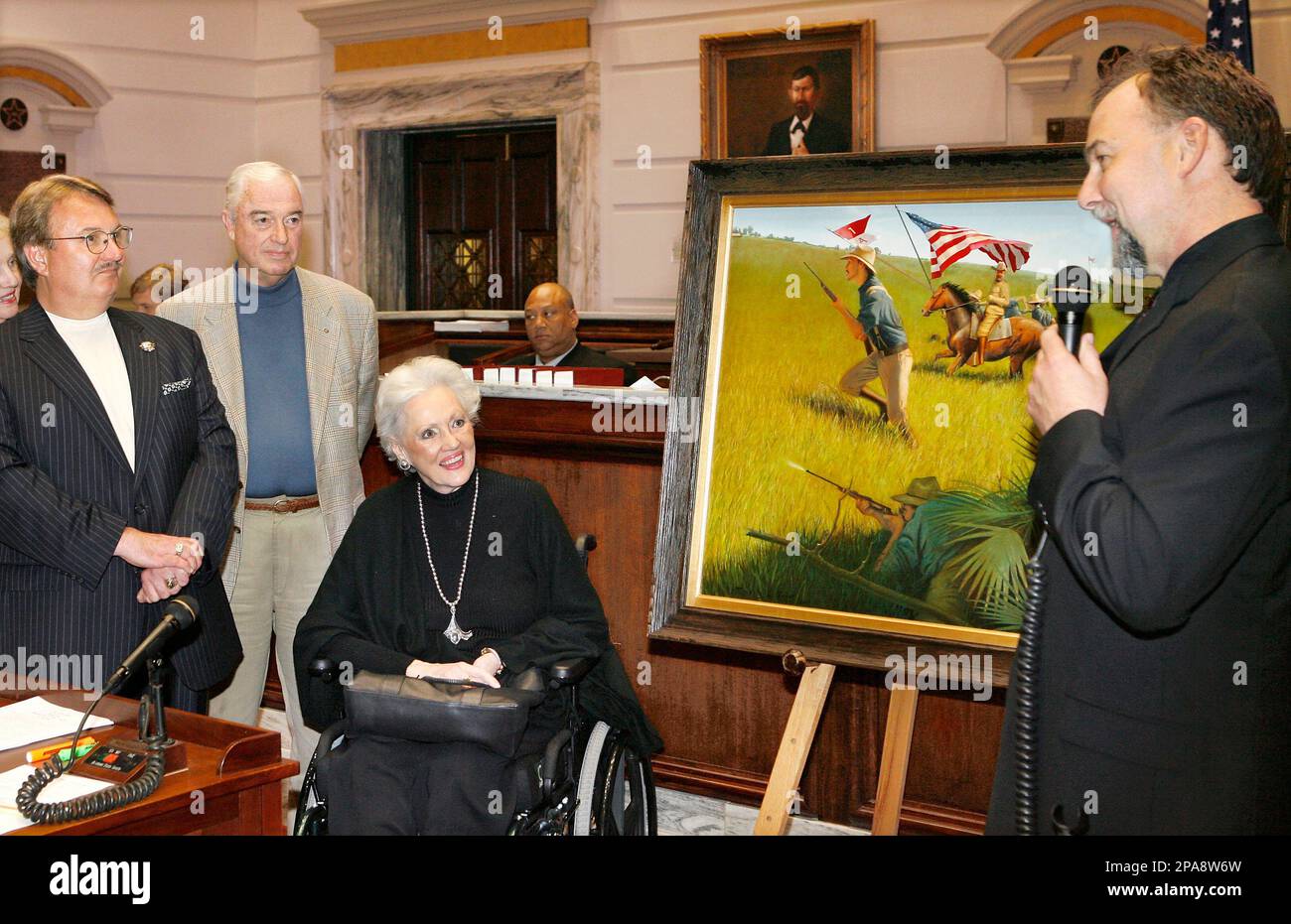 Artist Timothy Tyler, right, talks about his painting, the latest piece ...