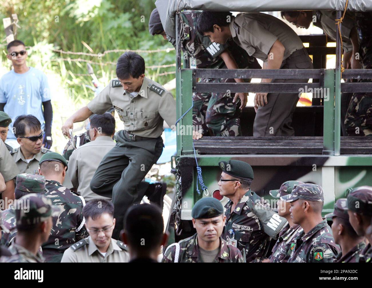 Philippine Army Scout Ranger Capt. Gerardo Gambala jumps out a tightly ...