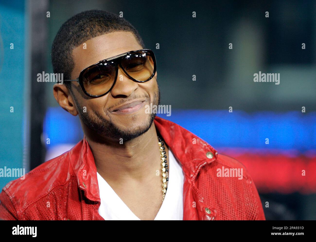 Hip hop artist Usher appears onstage during MTV's "Total Request Live ...