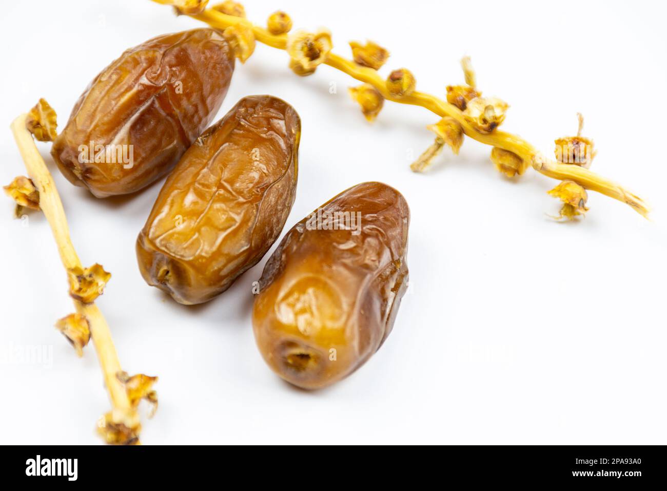 Close-up of Algerian royal dates on a white background. Ramadan concept ...