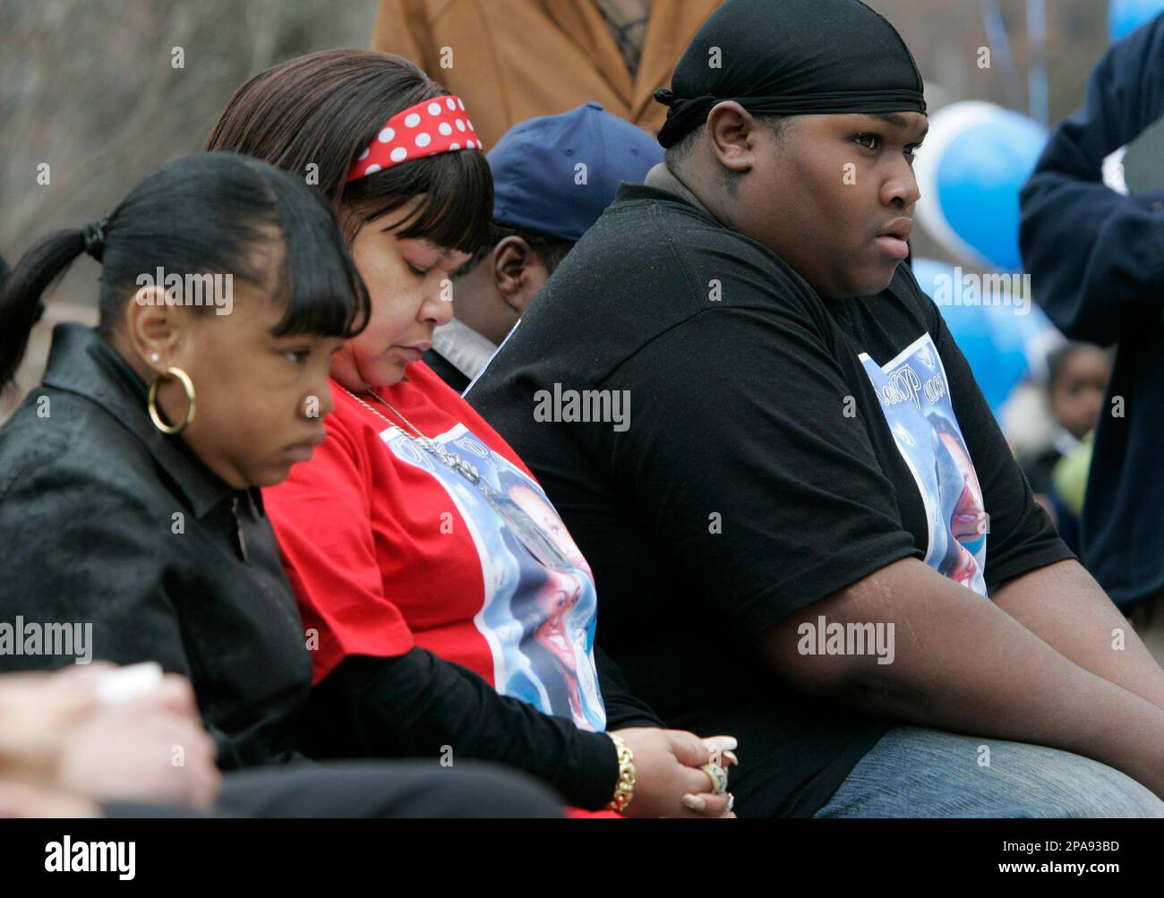 Shalga Hightower, second from left, is flanked by her children, Jasmine ...
