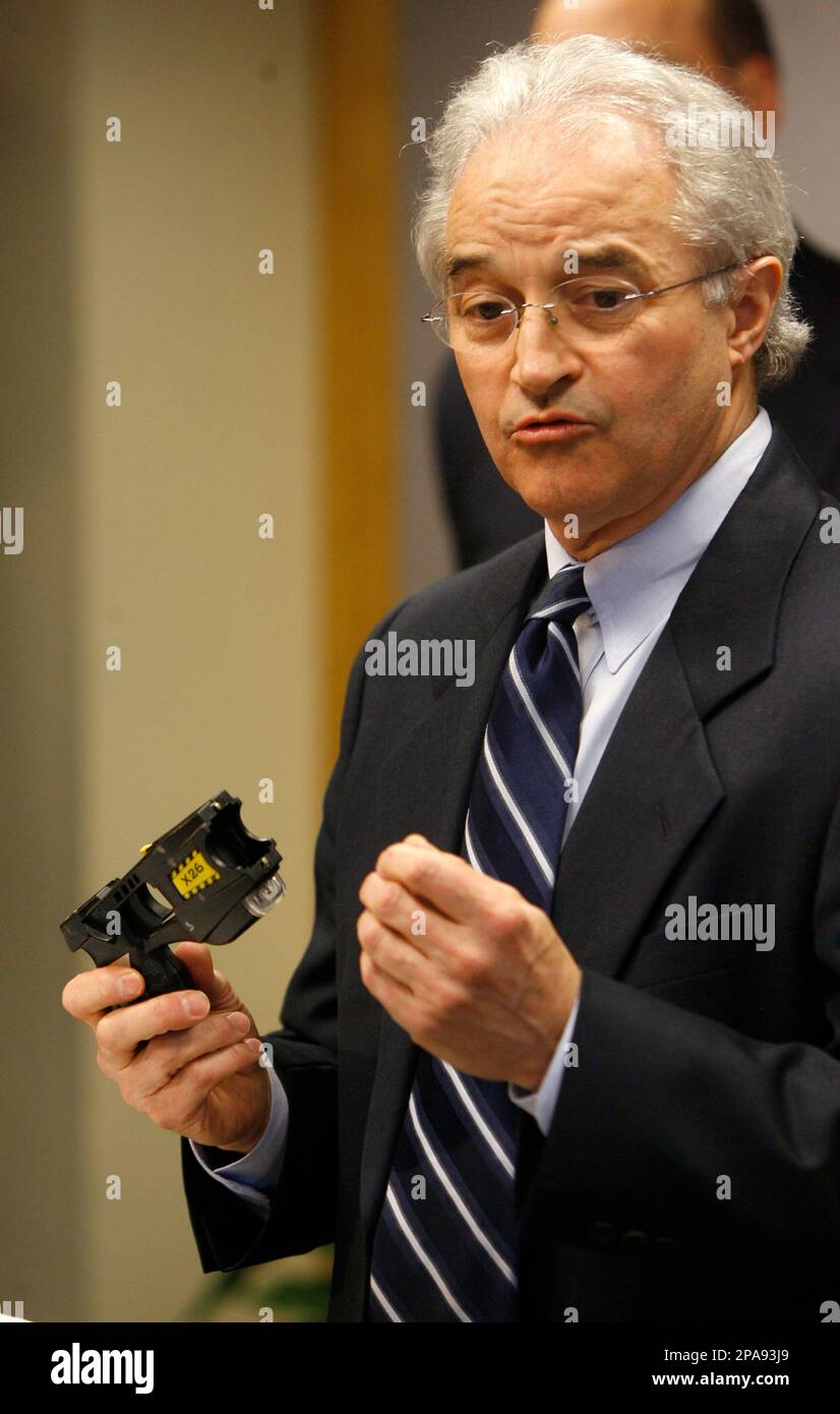 Vermont Attorney General William Sorrell holds a Taser in Montpelier ...