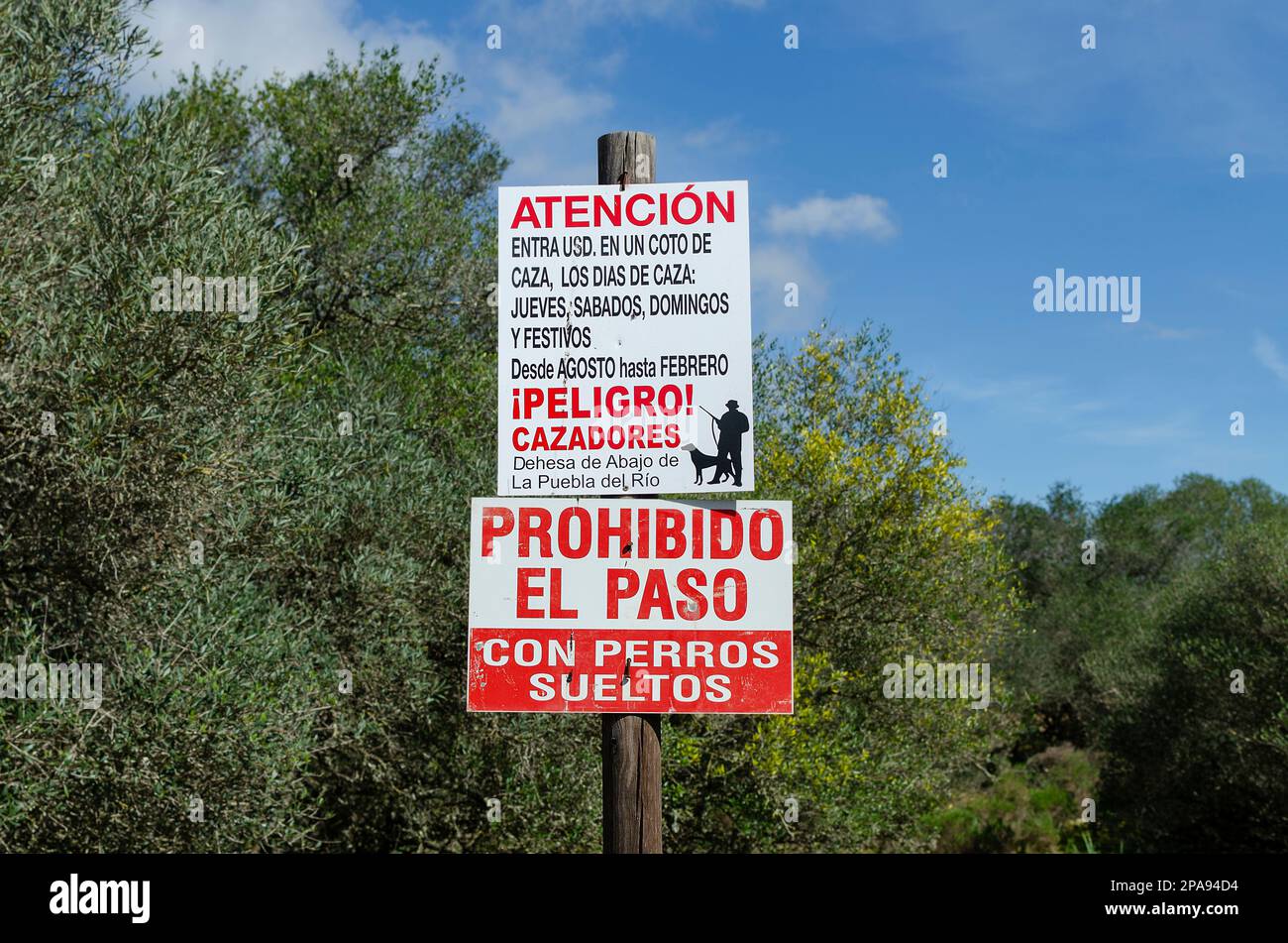 Spanish sign "Attention, hunting ground. Hunting days: thursday ...