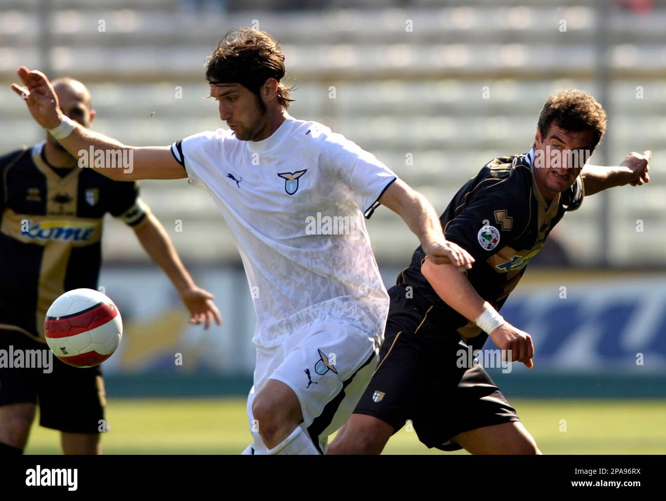 Lazio's Rolando Bianchi, left, and Parma's Paolo Castellini in action ...