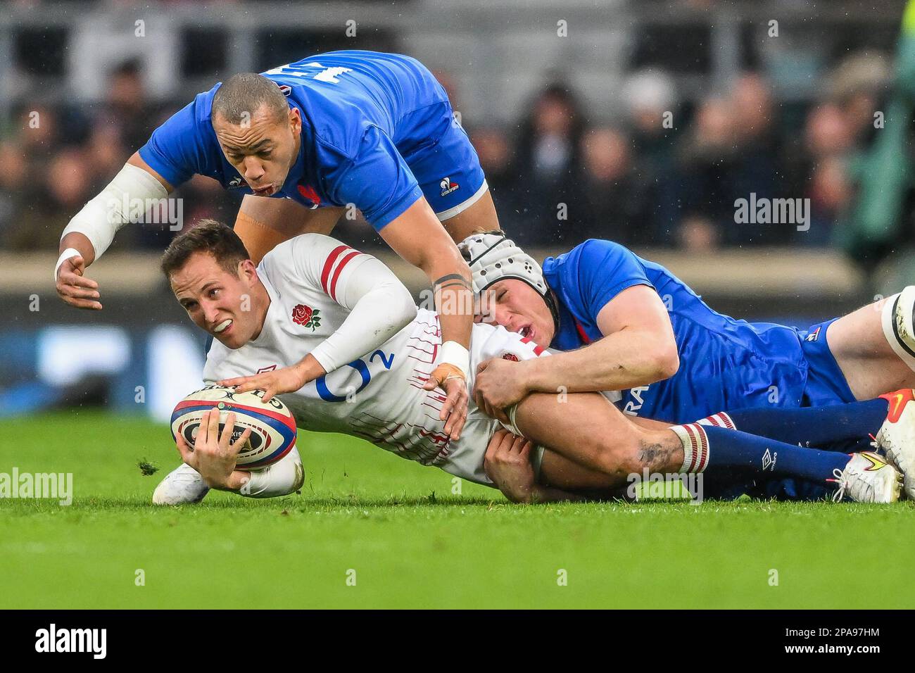 Max Malins of England is tackled by Thibaud Flament of France during ...