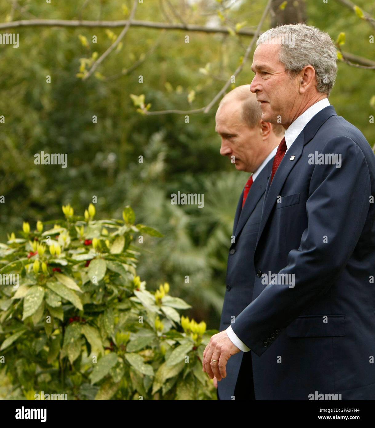 U.S. President George Bush, right, and Russian President Vladimir Putin ...