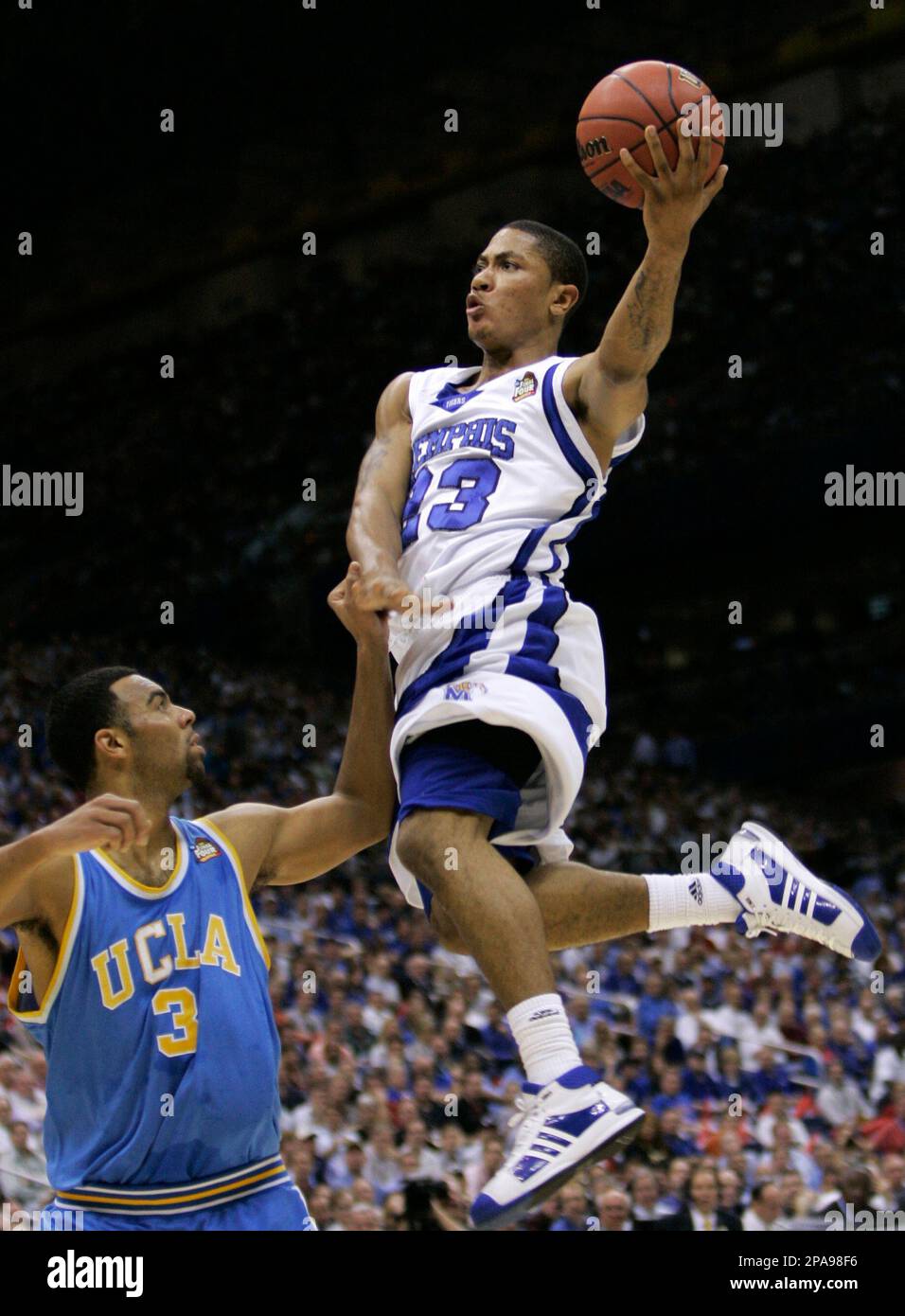 Memphis' Derrick Rose, right, shoots over UCLA's Josh Shipp (3) during ...