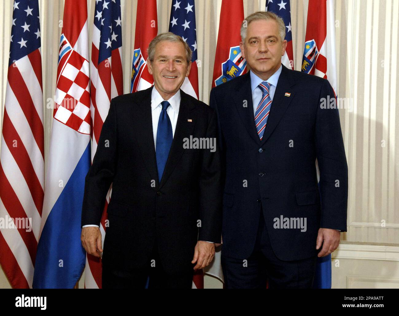 President George W. Bush, left, looks on, with Croatian Prime Minister ...