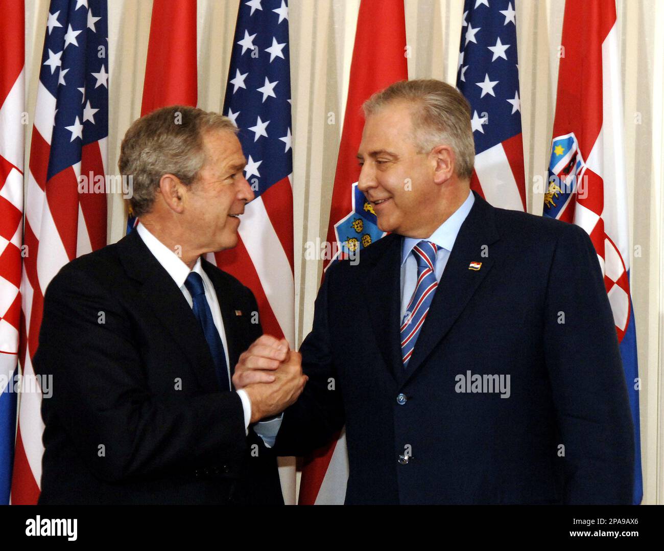 President George W. Bush gestures with Croatian Prime Minister Ivo ...