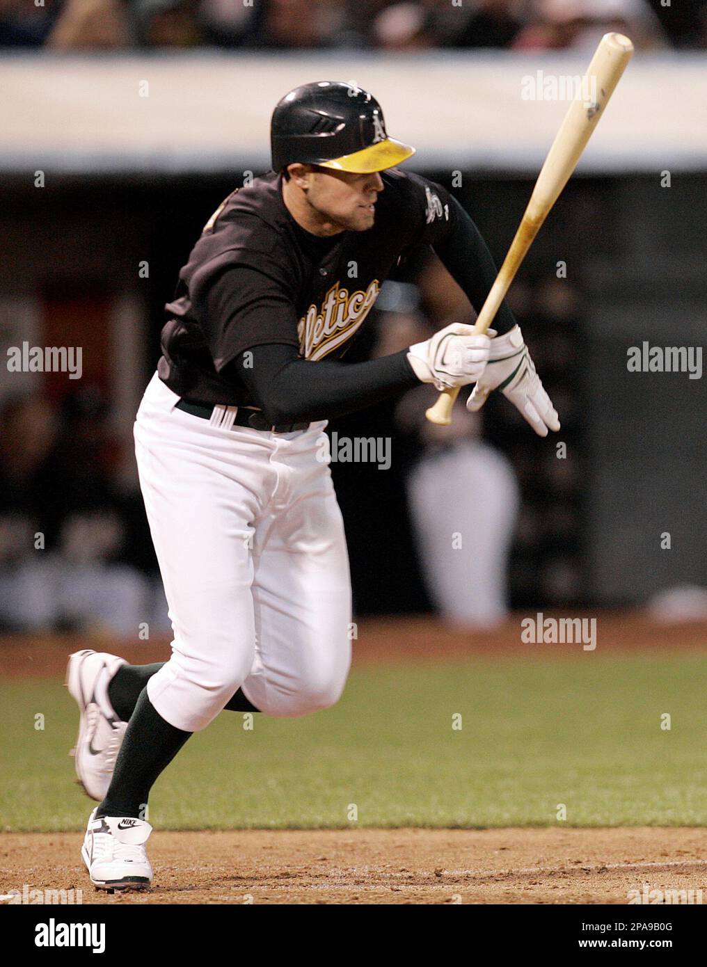 Oakland Athletics' Bobby Crosby swings for an RBI single off Cleveland ...