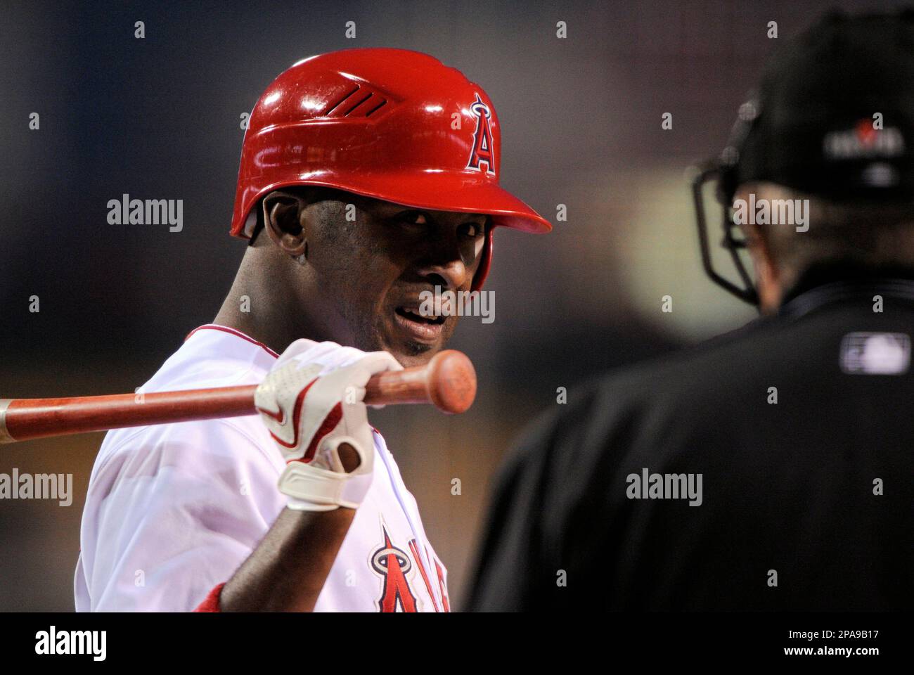 Los Angeles Angels' Gary Matthews Jr. looks to home plate umpire Derryl ...