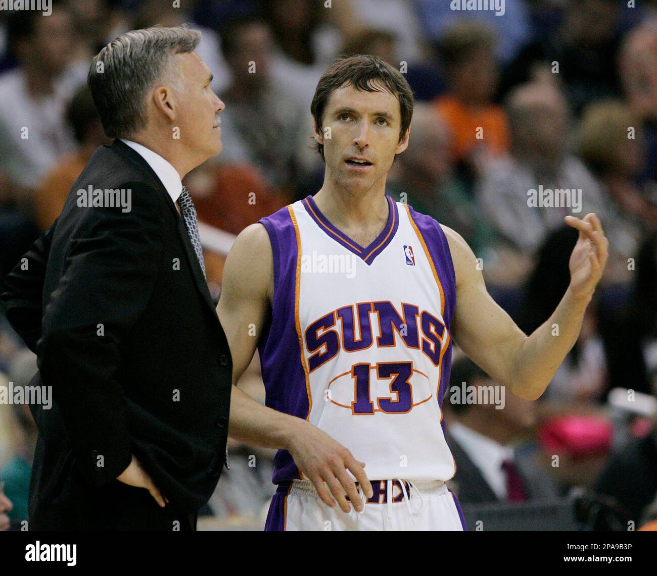 Phoenix Suns' Steve Nash (13) talks with head coach Mike D'Antoni ...