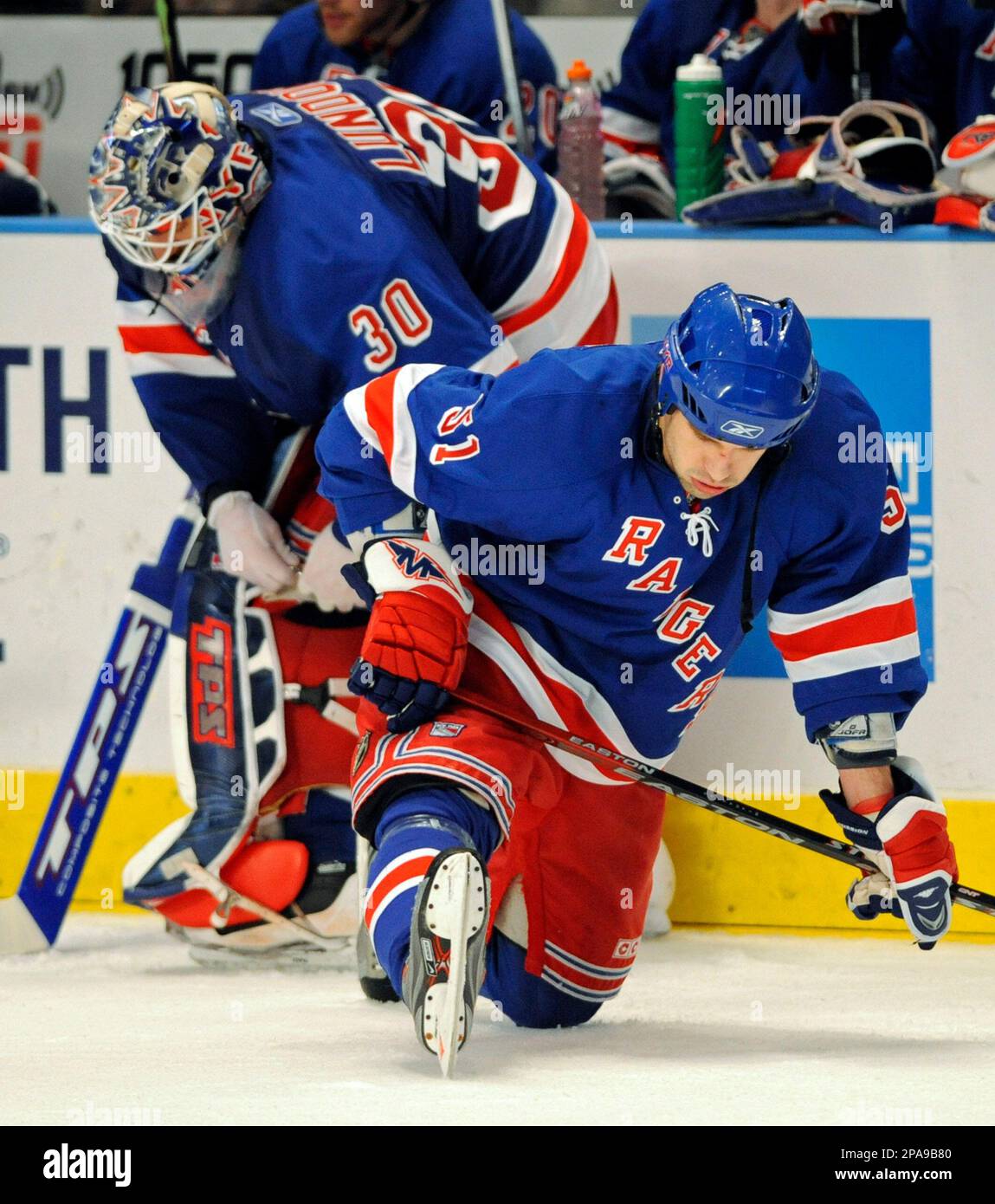 New York Rangers' Fedor Tyutin, of Russia, and goaltender Henrik ...