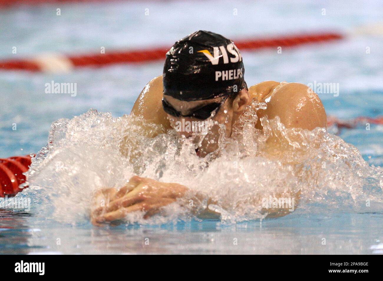 Michael Phelps swims in the 100-meter breaststroke during the Columbus ...