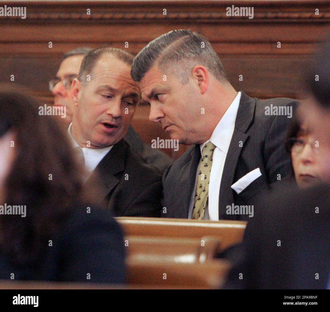 Superintendent of the R.I. State Police, Col. Brendan Doherty, right, talks with state police ...