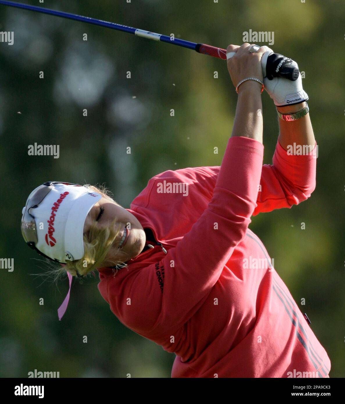 Natalie Gulbis hits her drive on the 11th hole during the second round ...