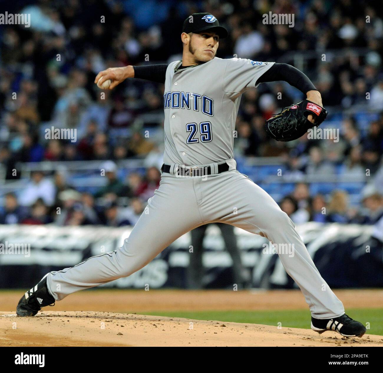 Toronto Blue Jays pitcher Dustin McGowan delivers the ball to the New ...