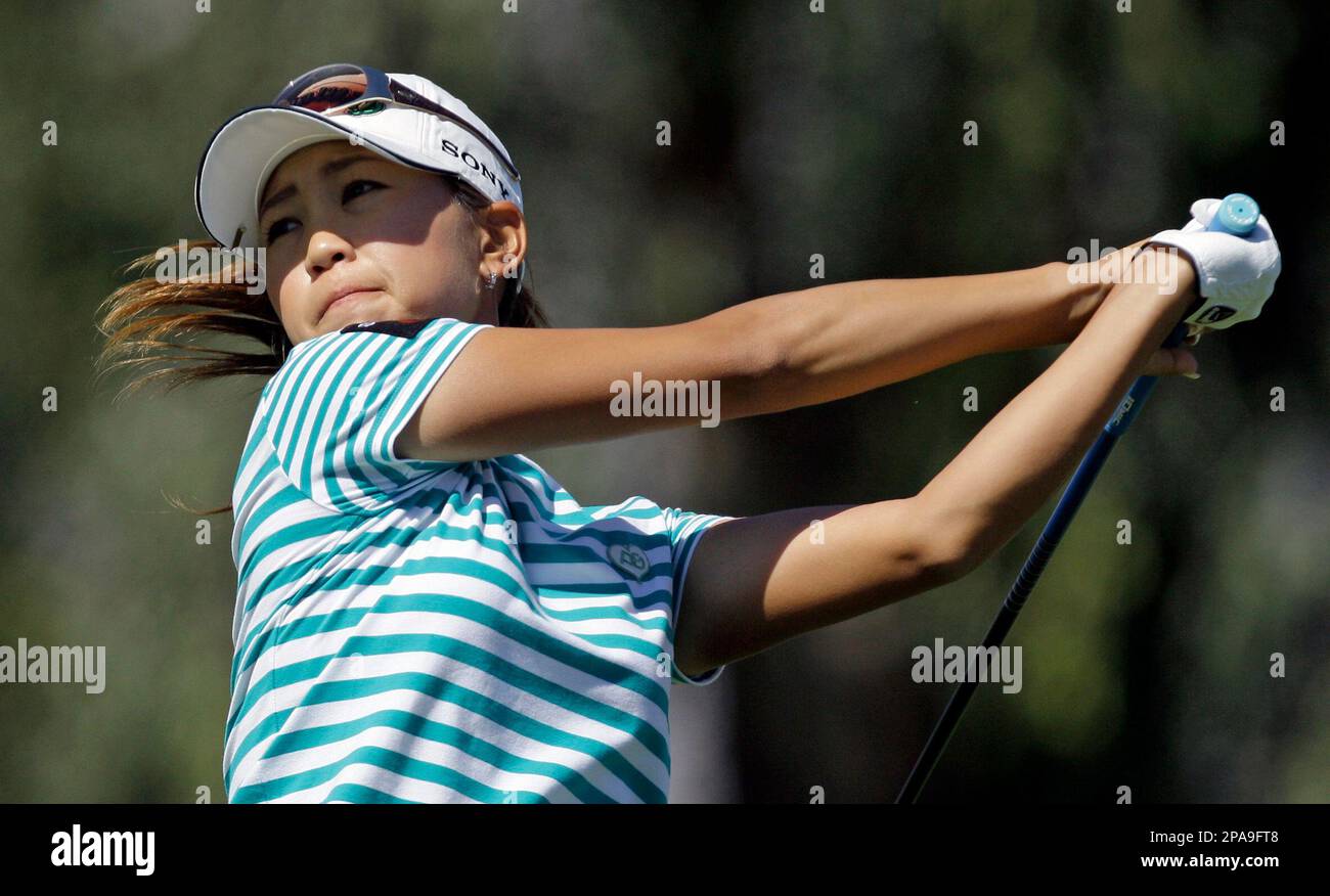 LPGA golfer Momoko Ueda of Japan, watches her drive on the ninth hole ...