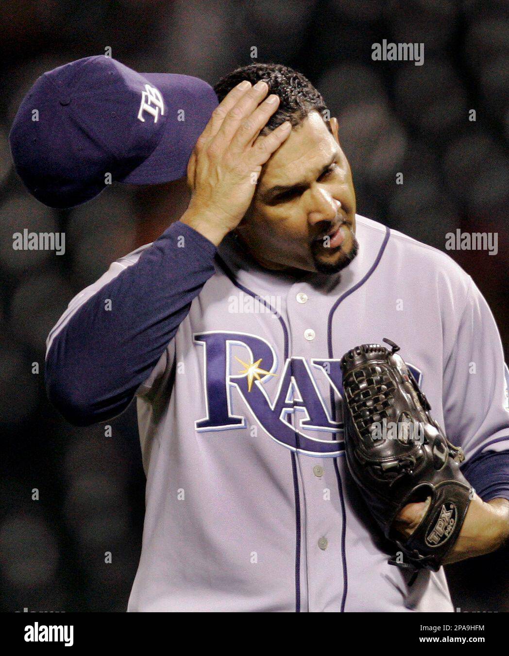Tampa Bay Rays pitcher Al Reyes reacts after giving up two runs to the ...