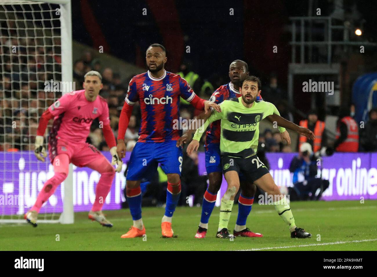 London, UK. 11th Mar, 2023. Jordan Ayew of Crystal Palace and Bernardo ...