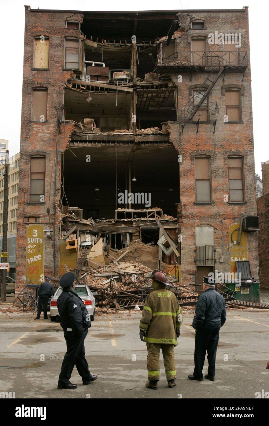 The rear wall of a vacant building is shown collapsed in the Greektown ...