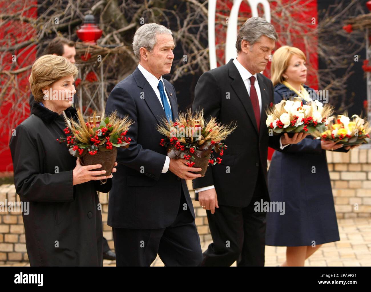 U.S. President George Bush and first lady Laura Bush lay tribute at the ...
